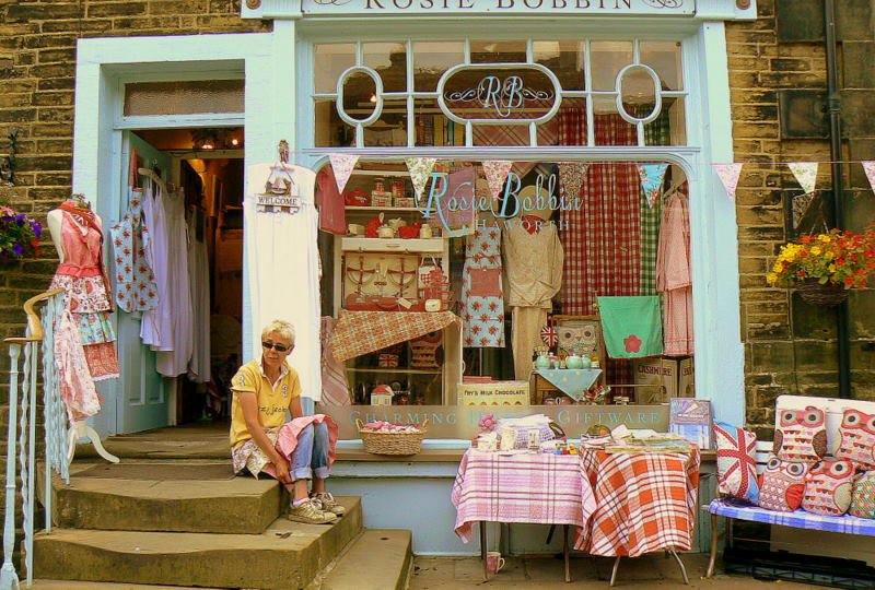 "One of the colourful shops!" by Christine Cooney at PicturesofEngland.com